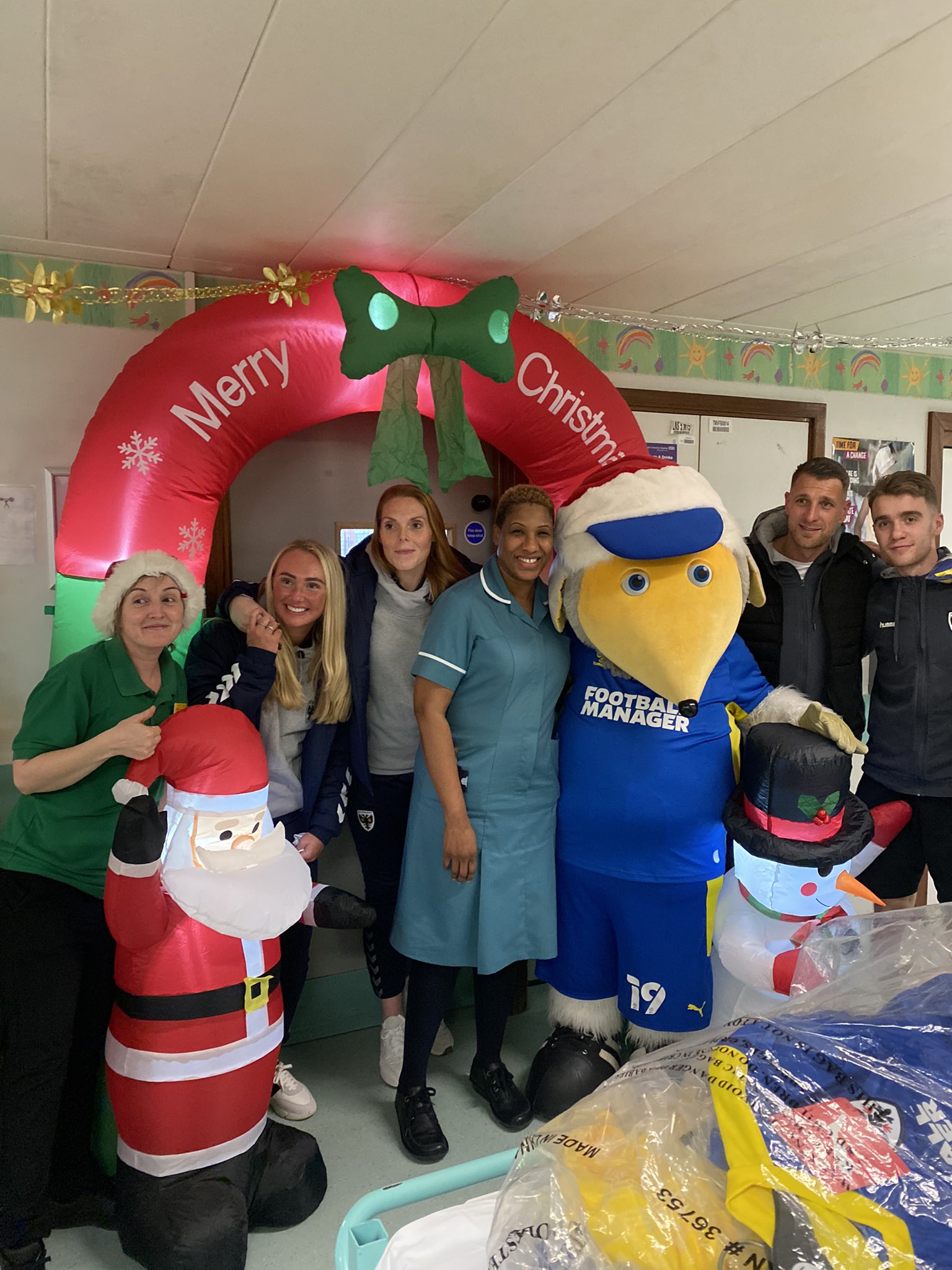 AFC Wimbledon spread the Christmas cheer to St George’s paediatric ...